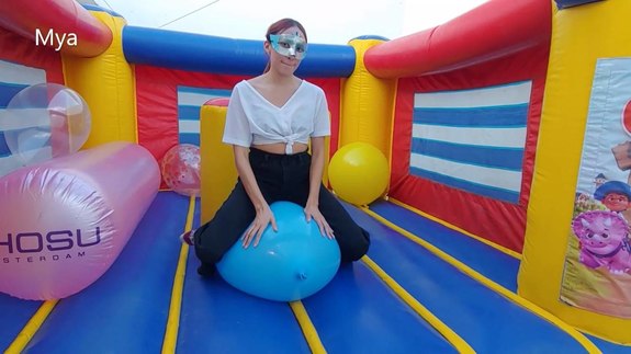 Mya ride to pop balloons in the inflatable castle!! - julielooner. Mya ...