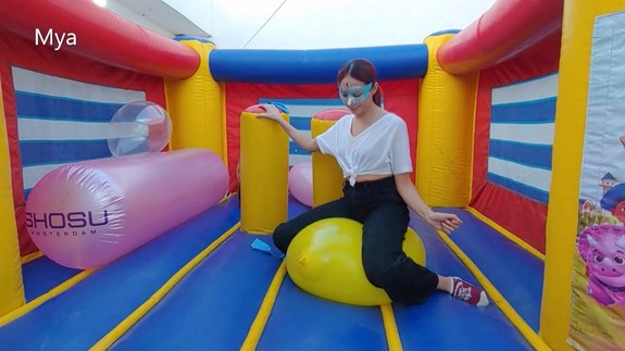 Mya ride to pop balloons in the inflatable castle!! - julielooner. Mya ...