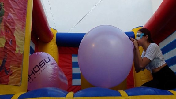 Mya ride to pop balloons in the inflatable castle!! - julielooner. Mya ...